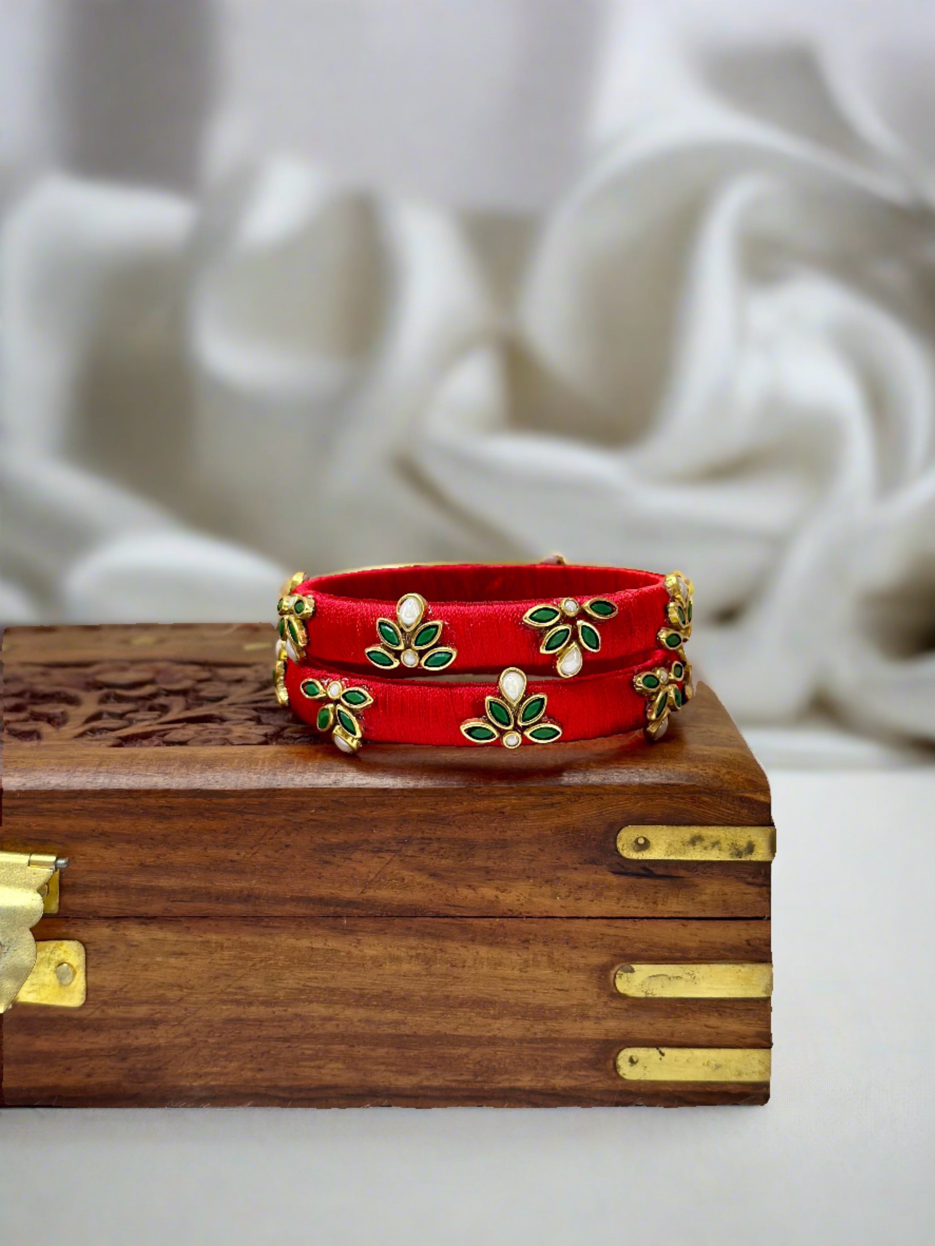 Red Silk Thread Kada Kundan Bangles with Green and Peal White Kundans ...